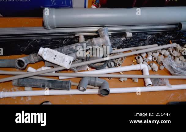 PVC pipes and fittings in preparation for plumbing installation or ...