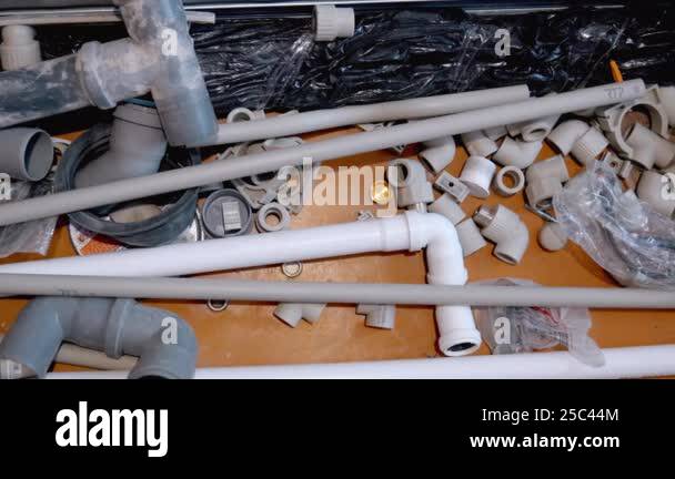 PVC pipes and fittings for assembling plumbing system in house under ...