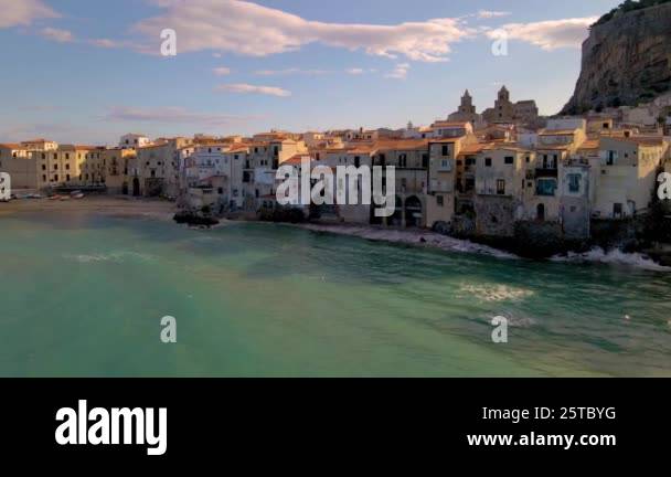 Stroll through the charming streets of a coastal town in Sicily, where ...