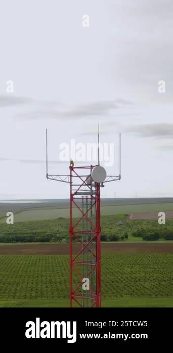 TV tower top with cellular plate and antennas receiving and sending ...