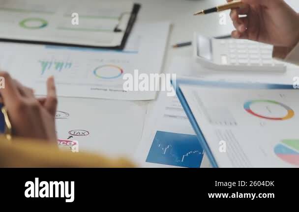 businessman working on graph with laptop computer in workplace Stock ...
