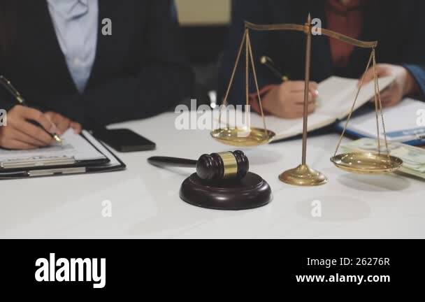 lawyer working in office with law and justice documents, law and ...