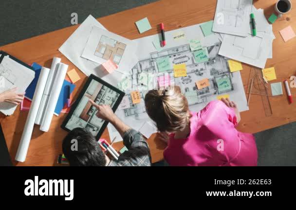 Top down aerial view of interior designer team choosing color from ...