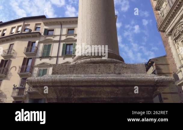 Verona, Italy 1 January 2025: Pigeon is landing on an ancient roman ...
