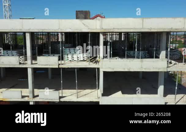 Above dolly move view on concrete skeleton of new unfinished large ... Above dolly move view on concrete skeleton of new unfinished large ...