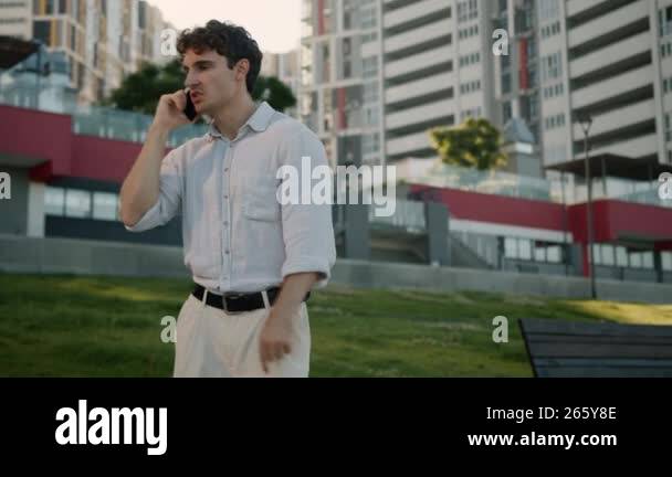 Angry Caucasian man talking mobile phone smartphone screaming conflict ...