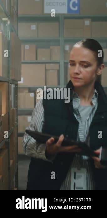 Female Sorting Center Employee Scans Parcel of Online Orders, Checks ...