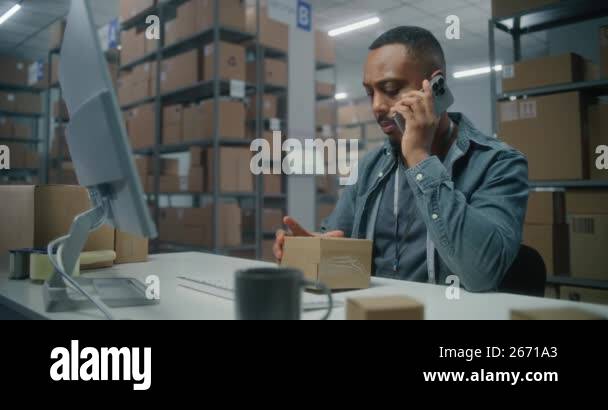 Warehouse of postal service or E-commerce store: African American ...