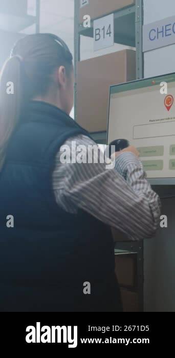 Female Logistics Manager Scans Cardboard Box at Postal Terminal with ...