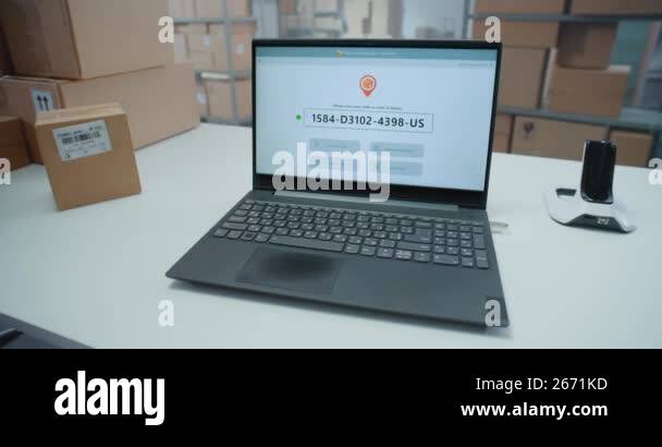Close Up of Inventory Manager Scanning Code on Cardboard Box with ...