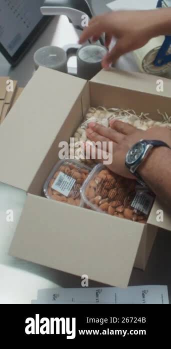 African American Shipping and Receiving Clerk Packing Cardboard Parcel ...