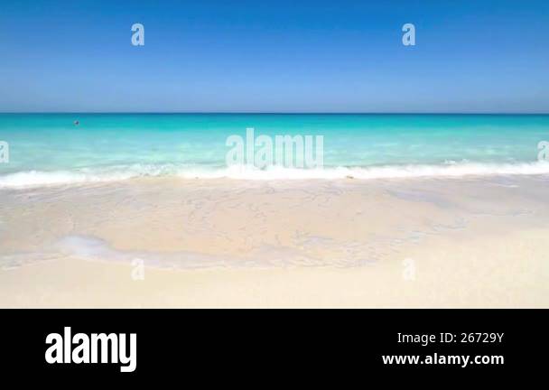 Beach waves on the seaside - the soothing and rhythmic motion of ocean ...