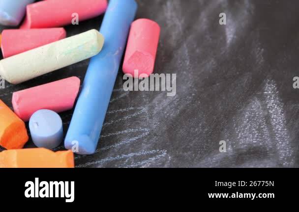 A vibrant assortment of intricately colored chalk pieces resting on a ...