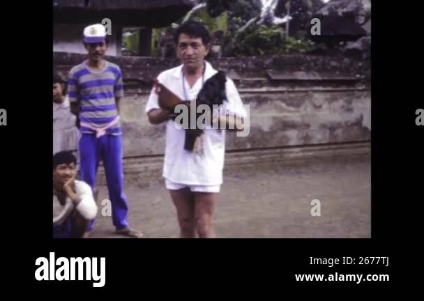 Denpasar, bali june 1985: balinese man wearing white traditional attire ...