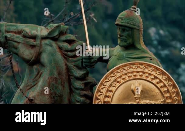 Eze, France - November 24, 2024: Bronze warrior statue at the top of a ...