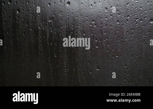 Time lapse water droplets forming on glass window. Condensation ...