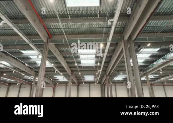 Horizontal shooting of ceilings of spacious expansive warehouse ...