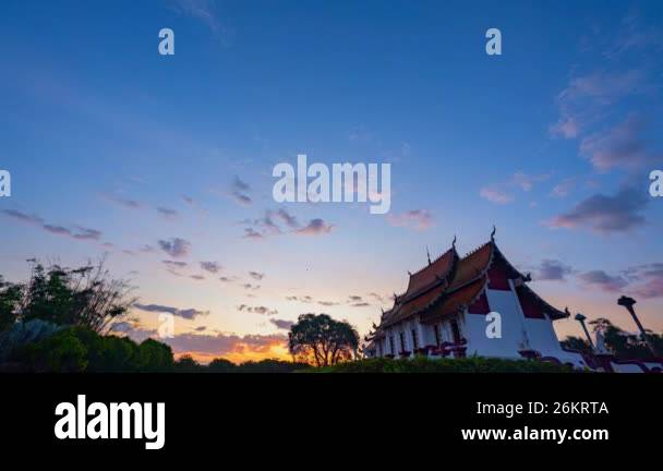 Time lapse stunning view of a traditional Baan Khun Temple in fog ...