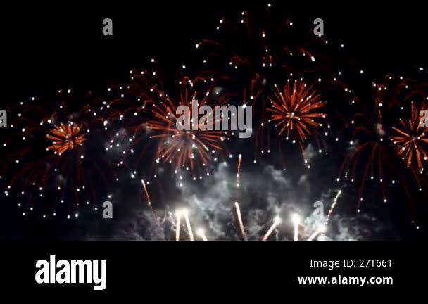 Closed-up of fireworks background with gold fireworks on midnight ...