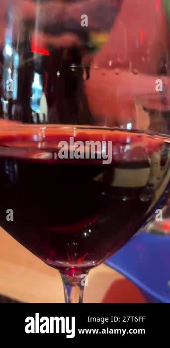 Vertical. Gathering of cheerful young friends toasting celebrating BBQ ...