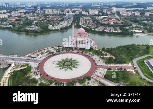 Drone view of Putra Square and pink Putra Mosque in Putrajaya, Malaysia ...