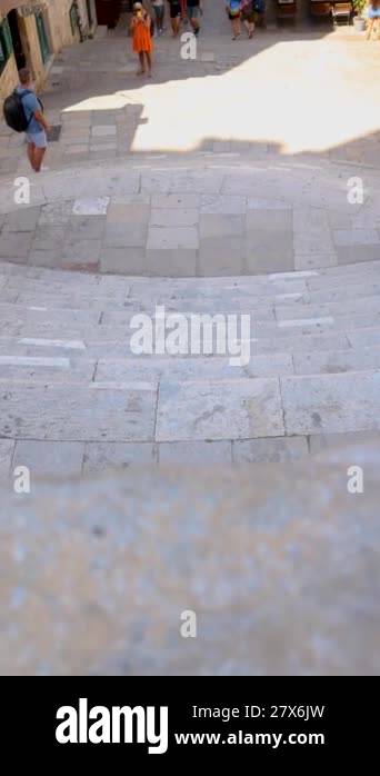 A weathered stone building showcasing a rustic facade, with details ...