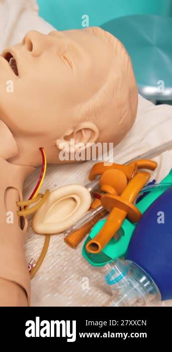 Plastic model of a man in hospital room. Male dummy with special ...
