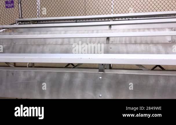 The cold, empty bleachers stand ready to welcome eager spectators ...