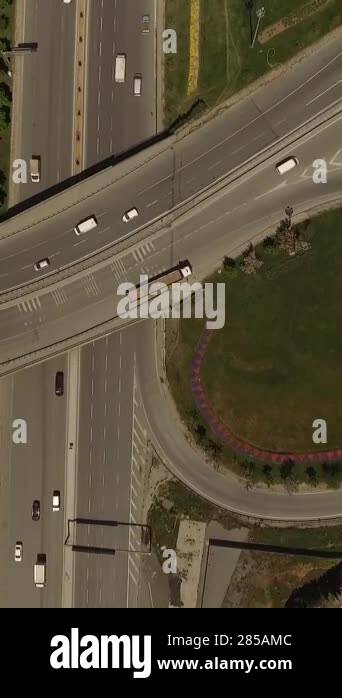 This is a view of a drone flying in city traffic, an aerial view of ...
