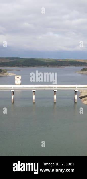 Lake barrage dam flume water aerial view, bridge over pond dam, puddle ...