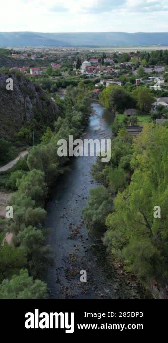 A drone footage of historic sufi monastery built on the cliffs by the ...