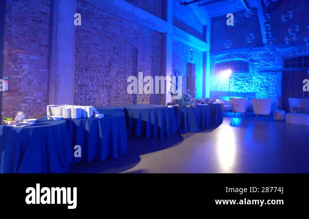 Riga, Latvia - January 11, 2025 - A banquet hall setup with tables ...