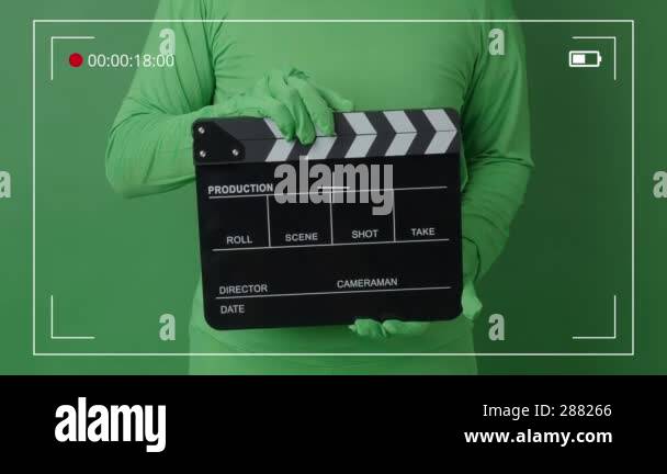 Movie Clapper board clapped by Hands on green screen camera background ...