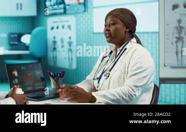 Portrait of african american medic expert having a conversation with ...