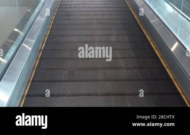 Moving walkway, moving sidewalk, moving pavement, travelator ...