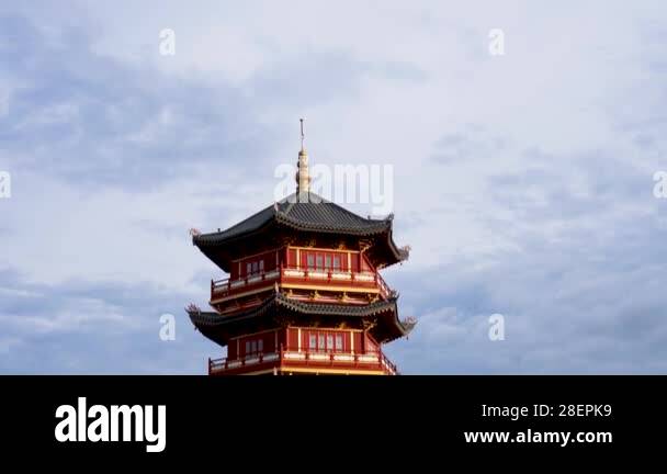 Slow Motion Tilt Up of Traditional Red and Gold Pagoda Architecture ...