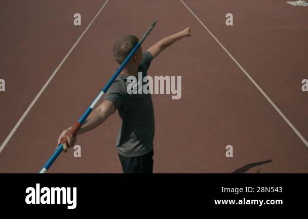 High-angle rear shot of male track and field athlete with acheiria ...