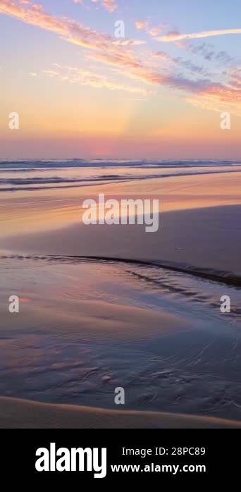 Atlantic ocean after sunset with surging waves at Fonte da Telha beach ...