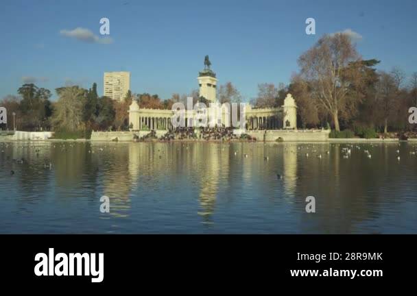 Amazing view of the Buen Retiro park from the lake at the sunset Stock ...