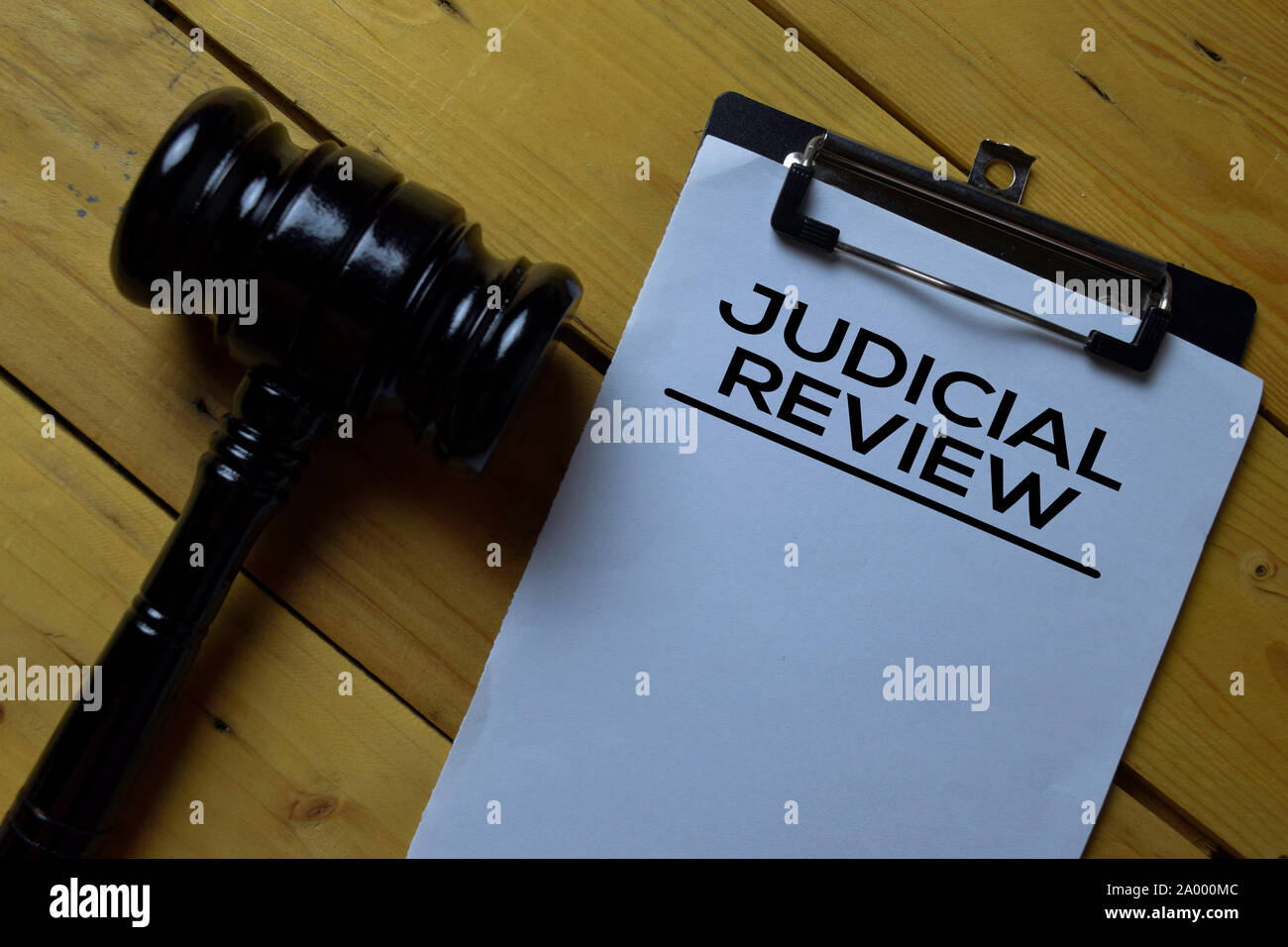 Judicial Review Document form and Black Judges gavel on wooden desk ...