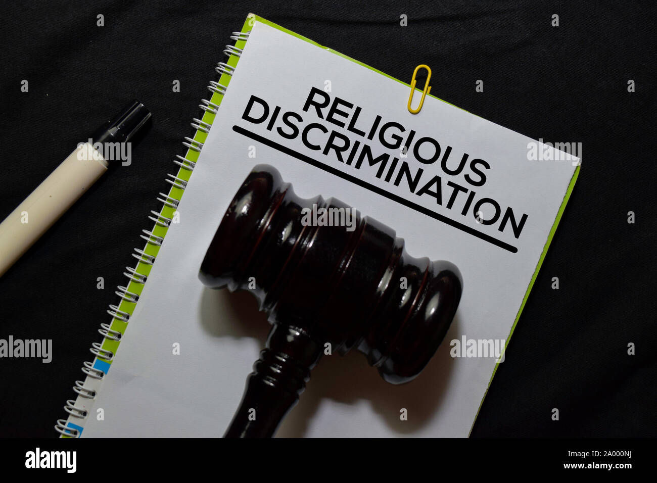 Religious Discrimination Document form and Black Judges gavel on office ...