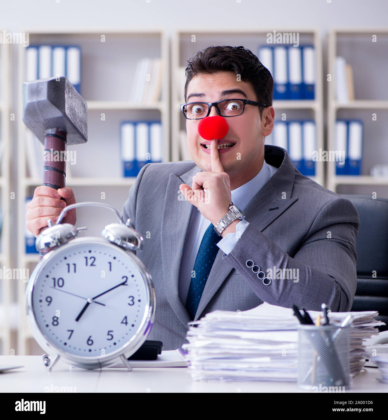 Smashing alarm clock hammer hi-res stock photography and images - Alamy