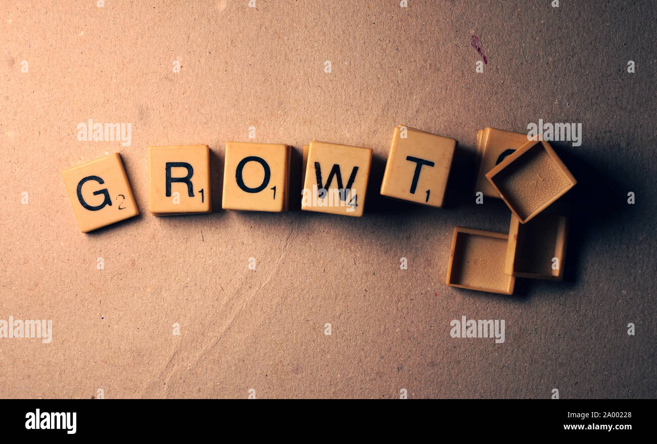 Growth tag label composed in scrabble letters Stock Photo - Alamy