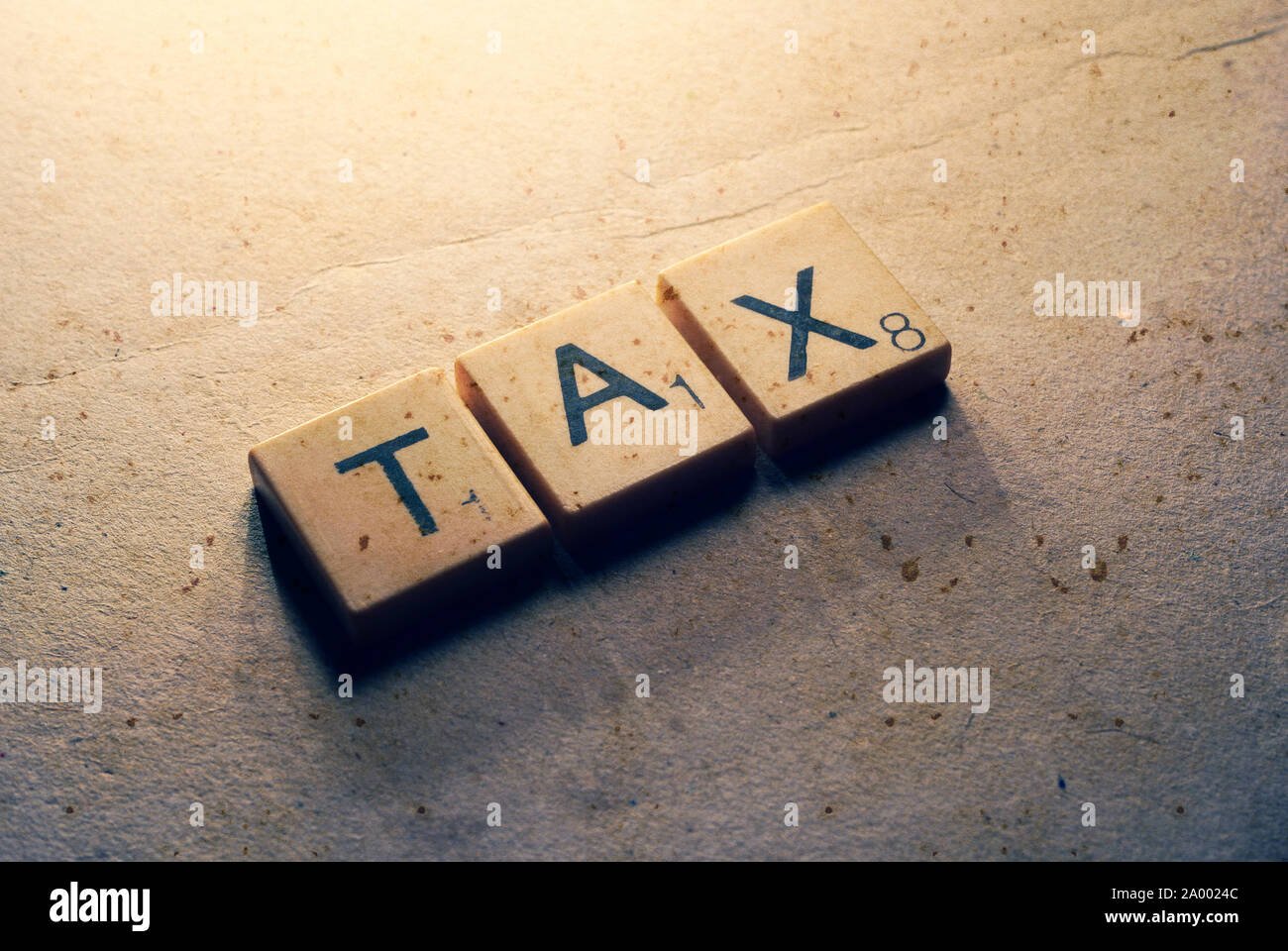 Tax label composed from scrabble letters Stock Photo - Alamy