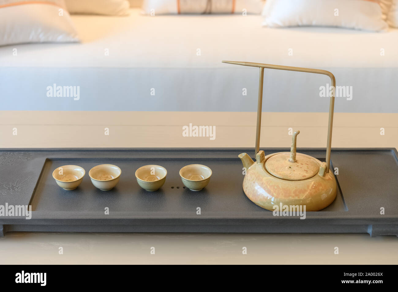 set of teapot and cups inside a living room Stock Photo - Alamy