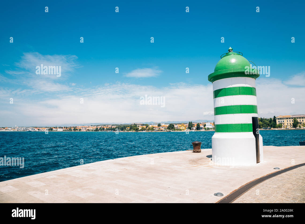 Lighthouse in beach town road hi-res stock photography and images - Alamy