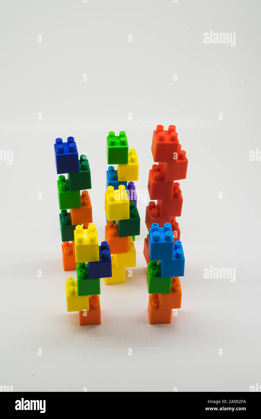Plastic building blocks tower isolated on white background Stock Photo ...