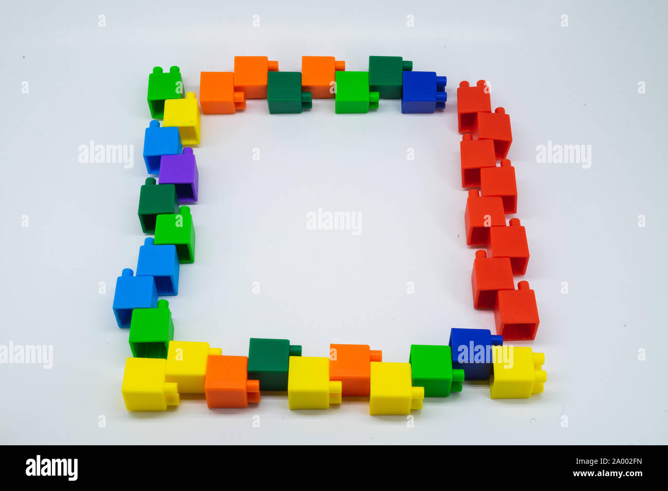 Plastic building blocks frame isolated on white background Stock Photo ...