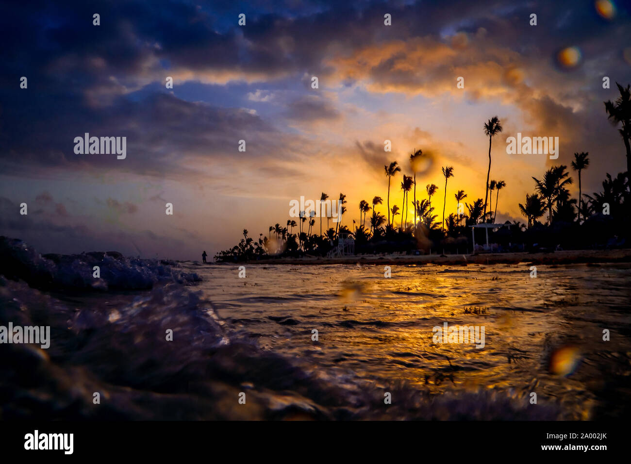 Carribean vacation, beautiful sunset over tropical beach in Punta Cana ...