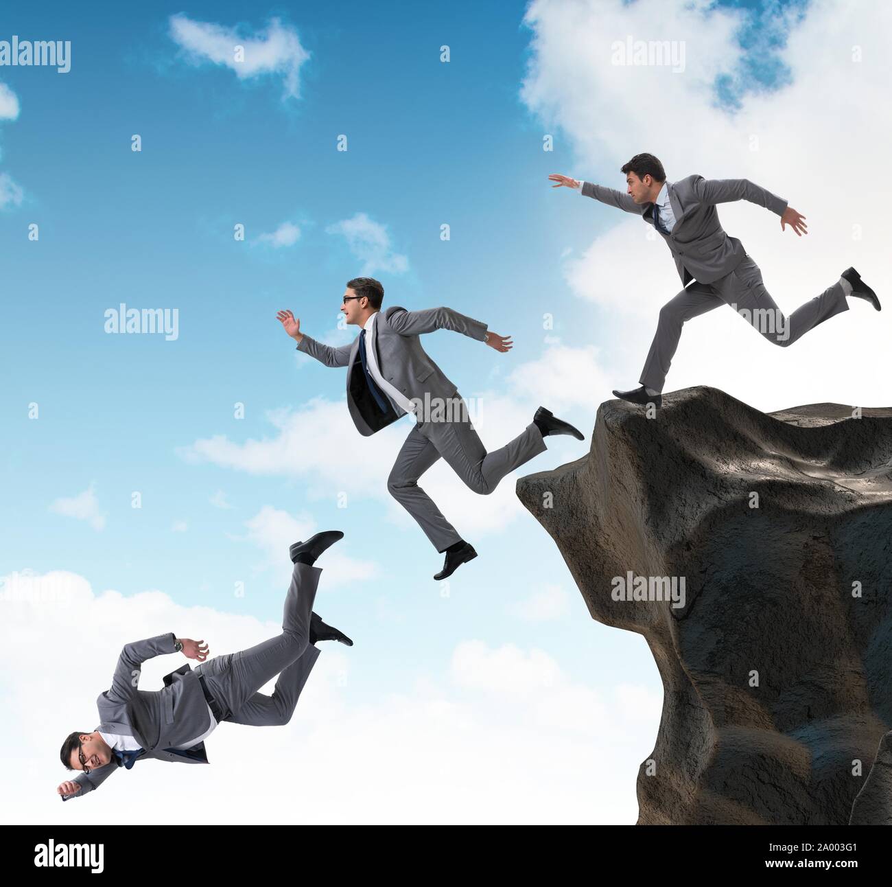 The business people falling off the cliff Stock Photo - Alamy